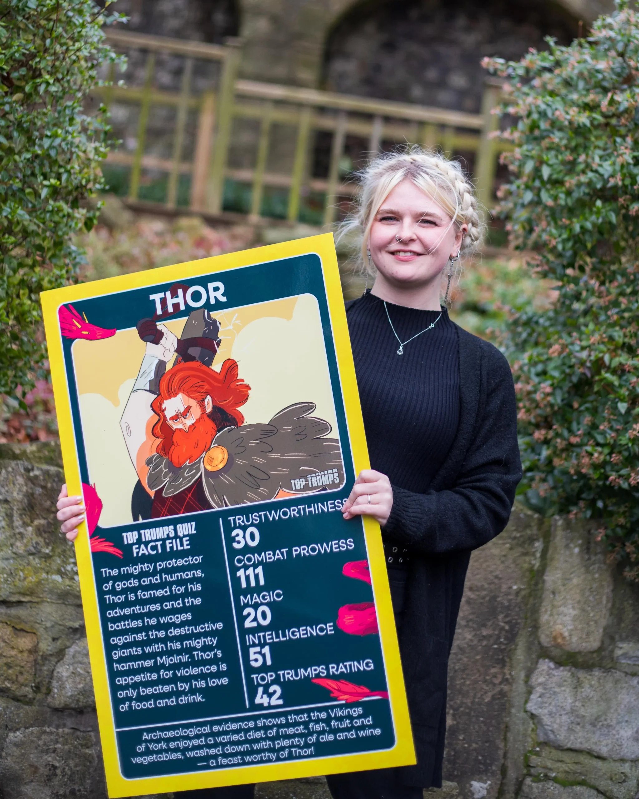 Illustrator Katie Smith Displays Giant Thor Top Trumps Card Outdoors ...